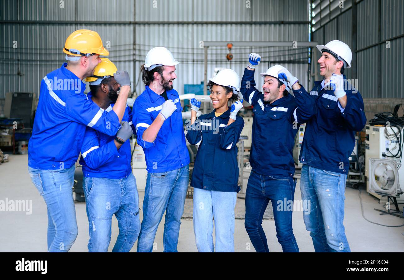Group of successful worker working at factory with happiness Stock ...