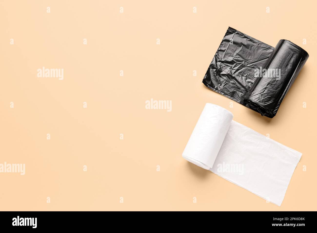 Different rolls of garbage bags on beige background Stock Photo - Alamy