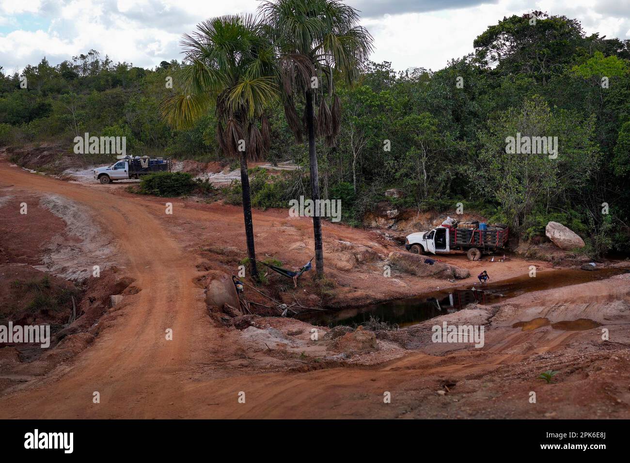 A damaged pickup truck lays parked on the side of a dirt road to El ...