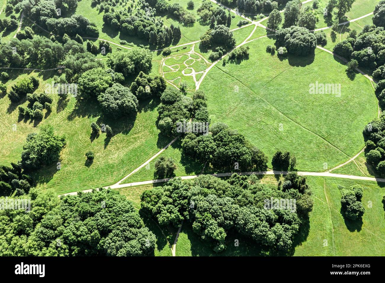summer park landscape with green trees, lawn and footpaths. aerial ...