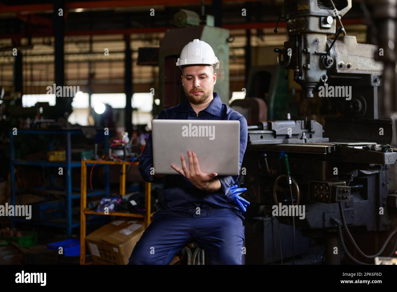 Maintenance engineer worker working at manufacturing plant factory ...