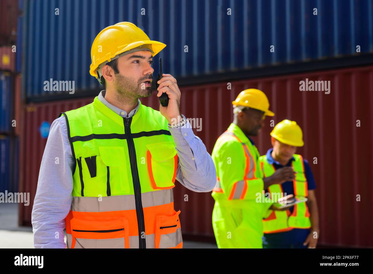 Warehouse engineer worker checking and working at industrial container ...