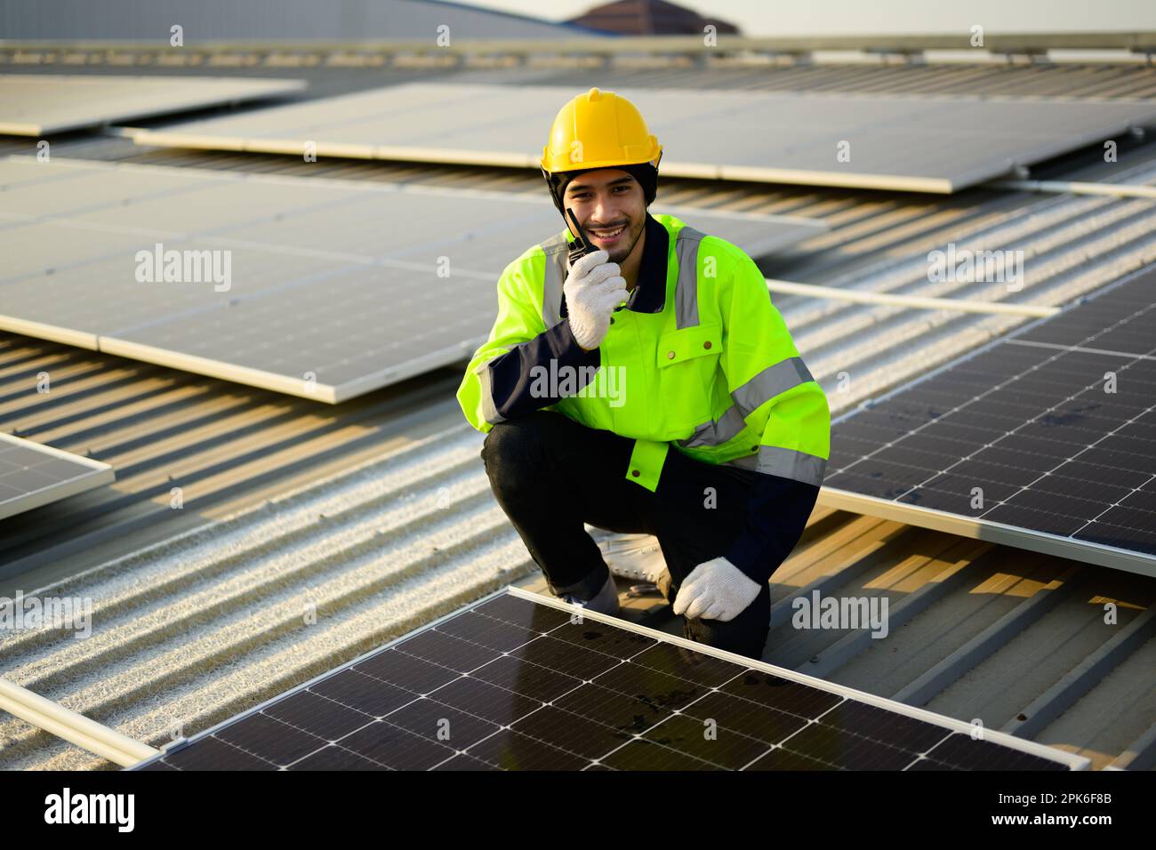 Engineer and technician checking and operating solar panels Stock Photo ...