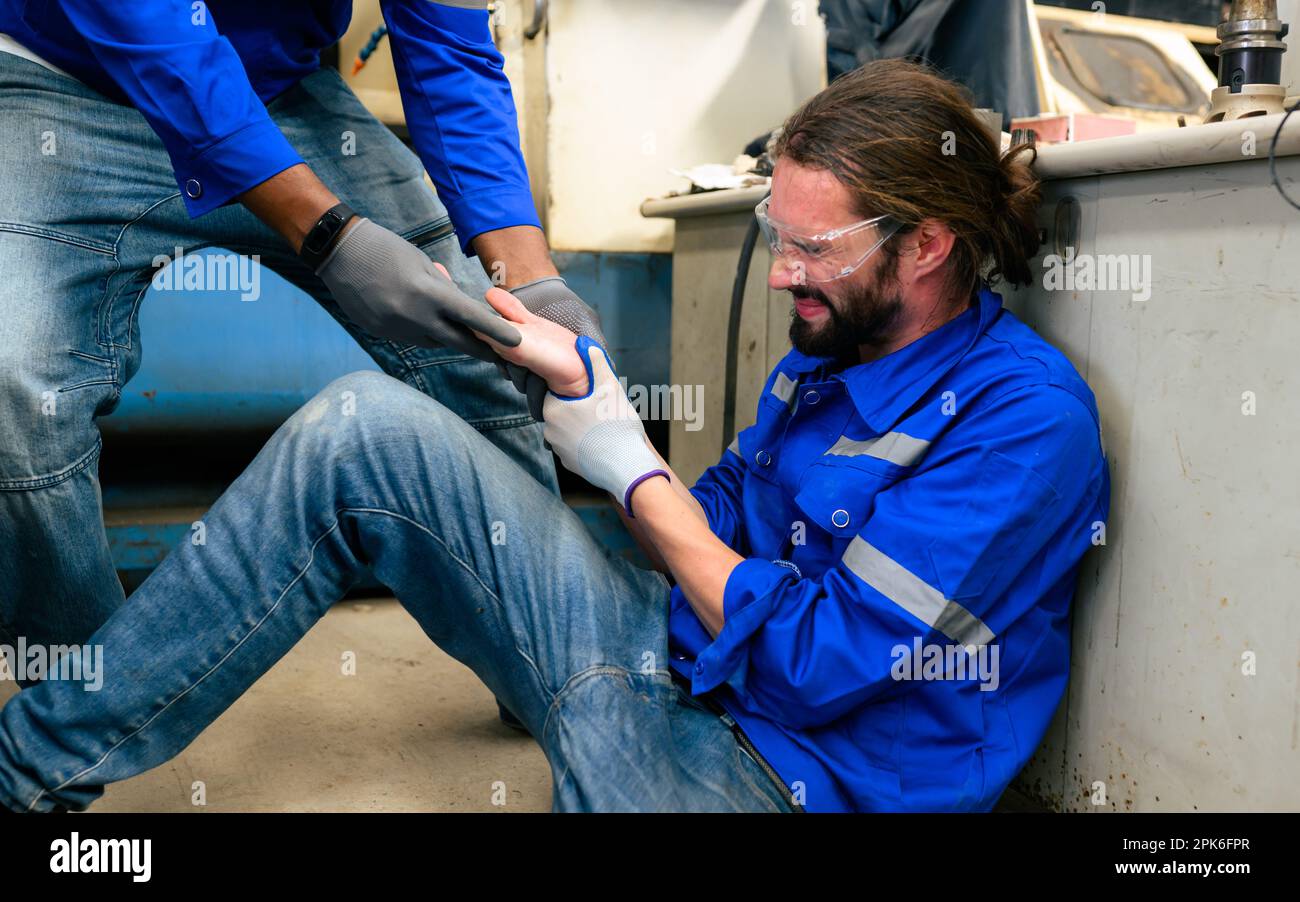 Engineer worker with accident at factory, People with injury Stock ...