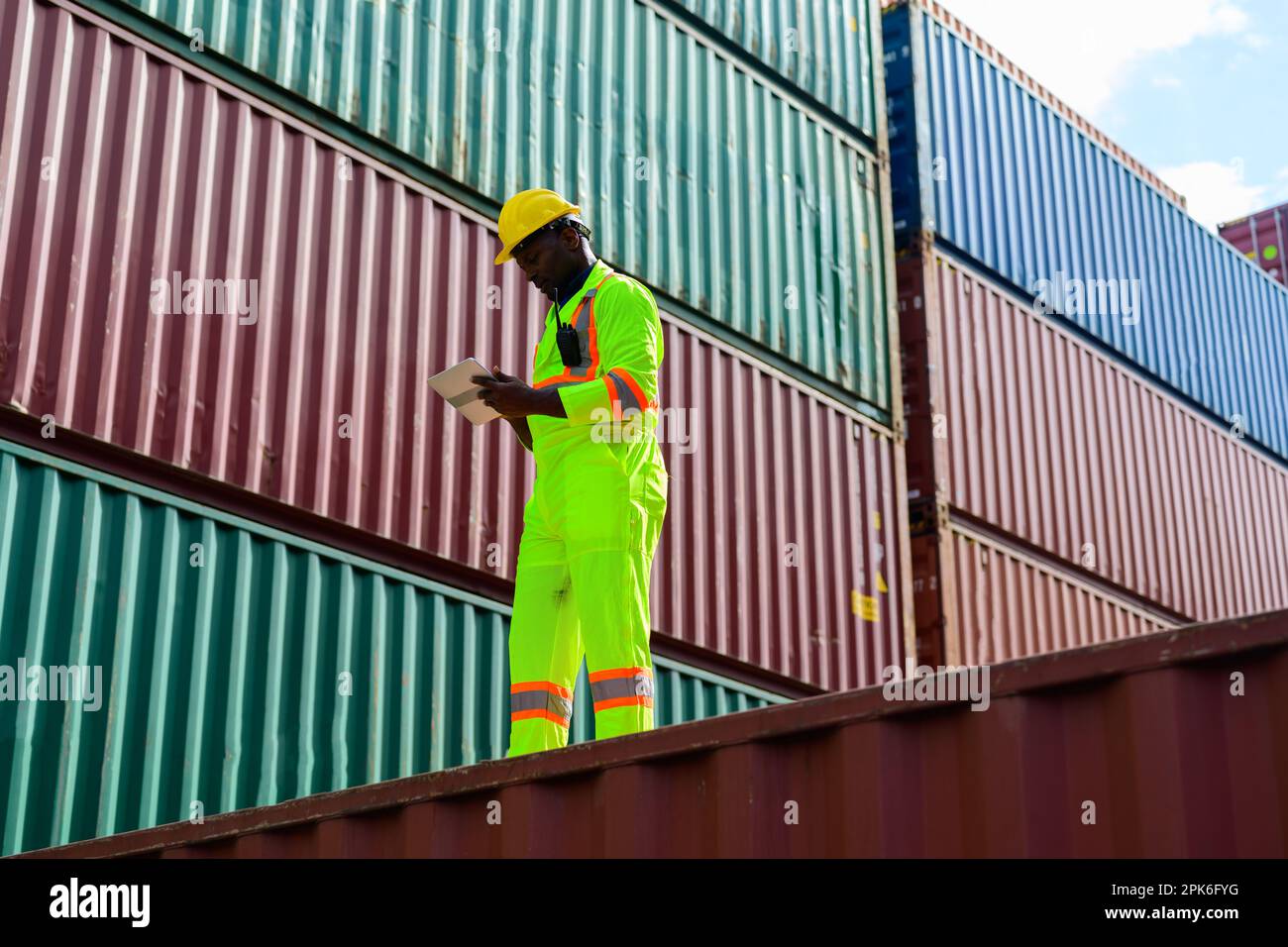 Warehouse engineer worker working at industrial container yard Stock ...