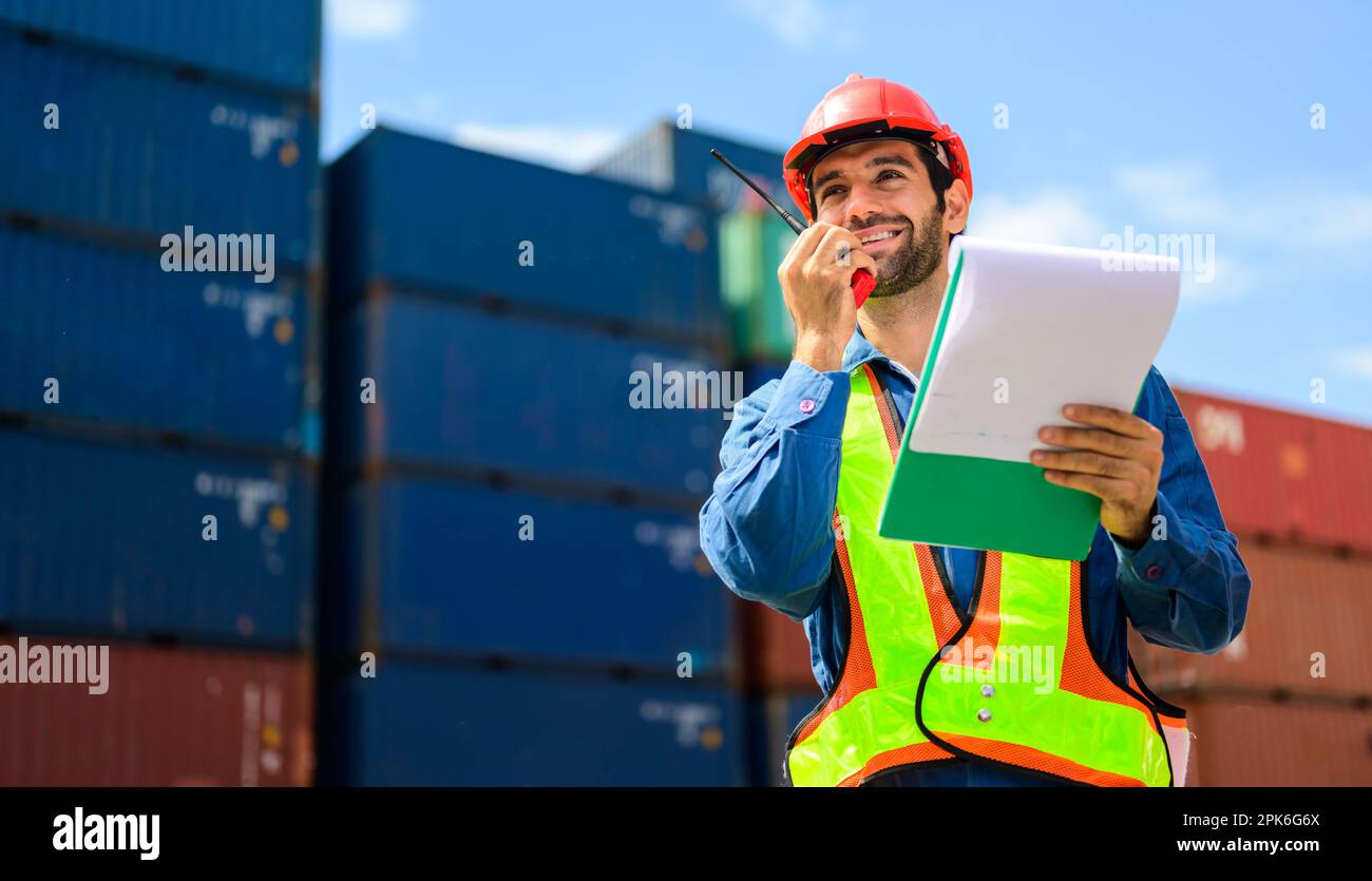 Warehouse engineer worker checking and working at industrial container ...