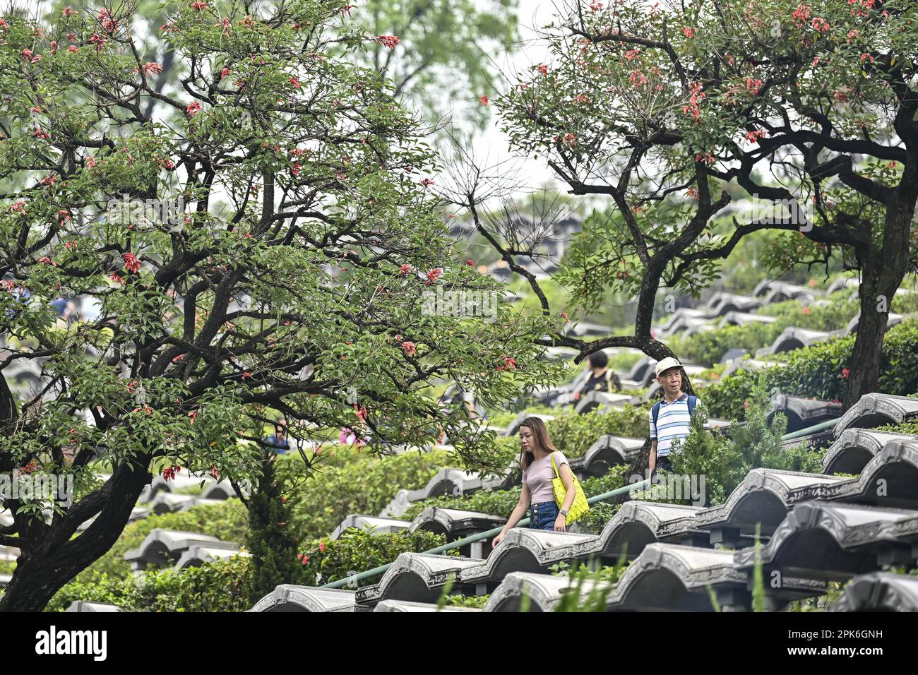 **CHINESE MAINLAND, HONG KONG, MACAU AND TAIWAN OUT** People sweep ...