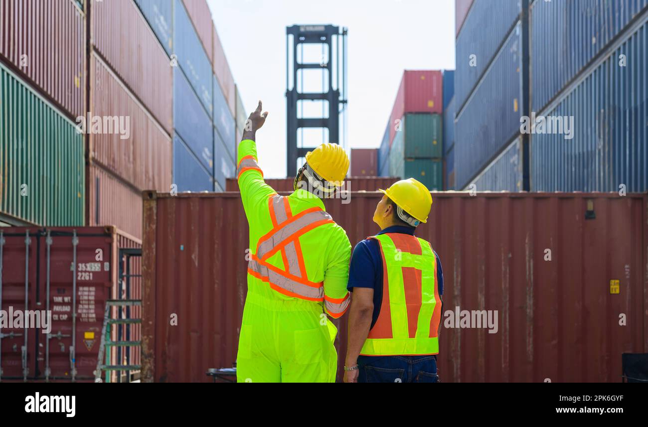 Warehouse engineer worker working at industrial container yard Stock ...