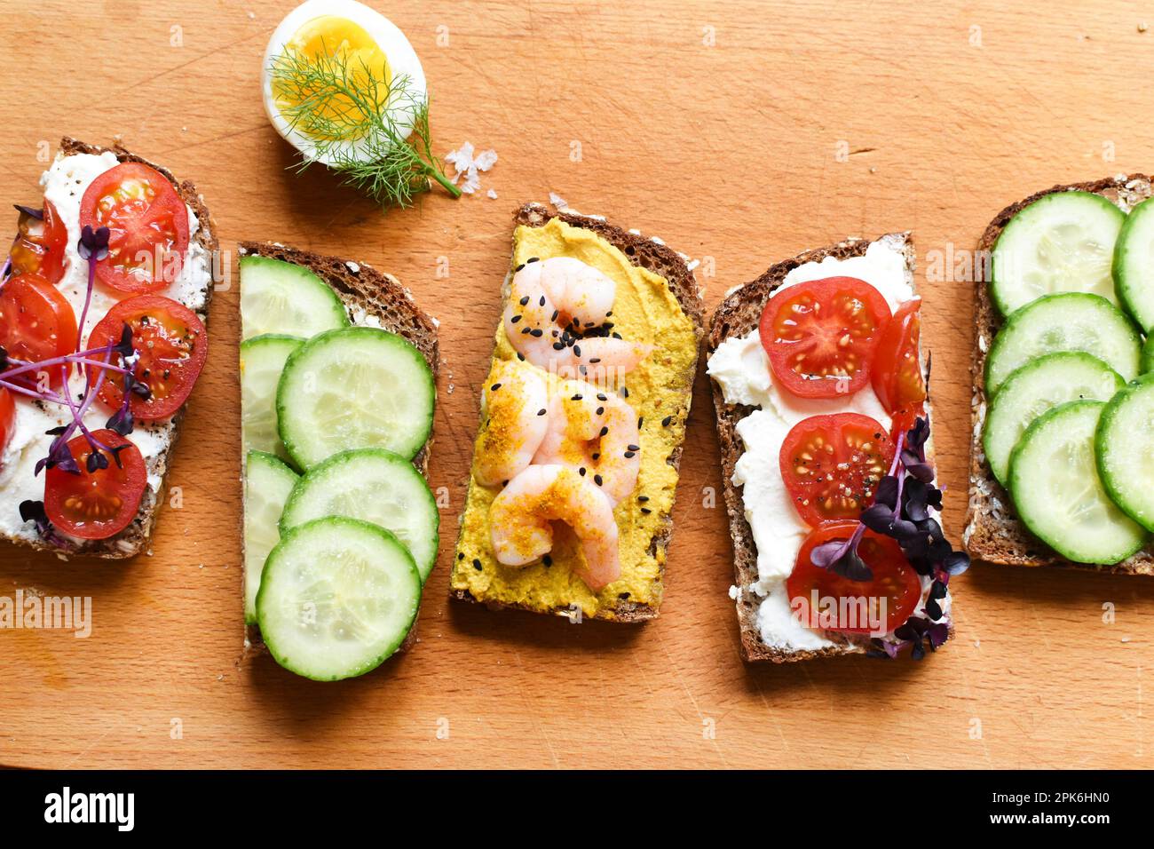 Swedish style brown bread with toppings Stock Photo - Alamy