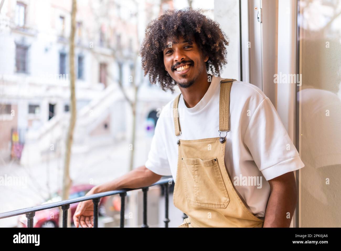 Man on the balcony hi-res stock photography and images - Alamy