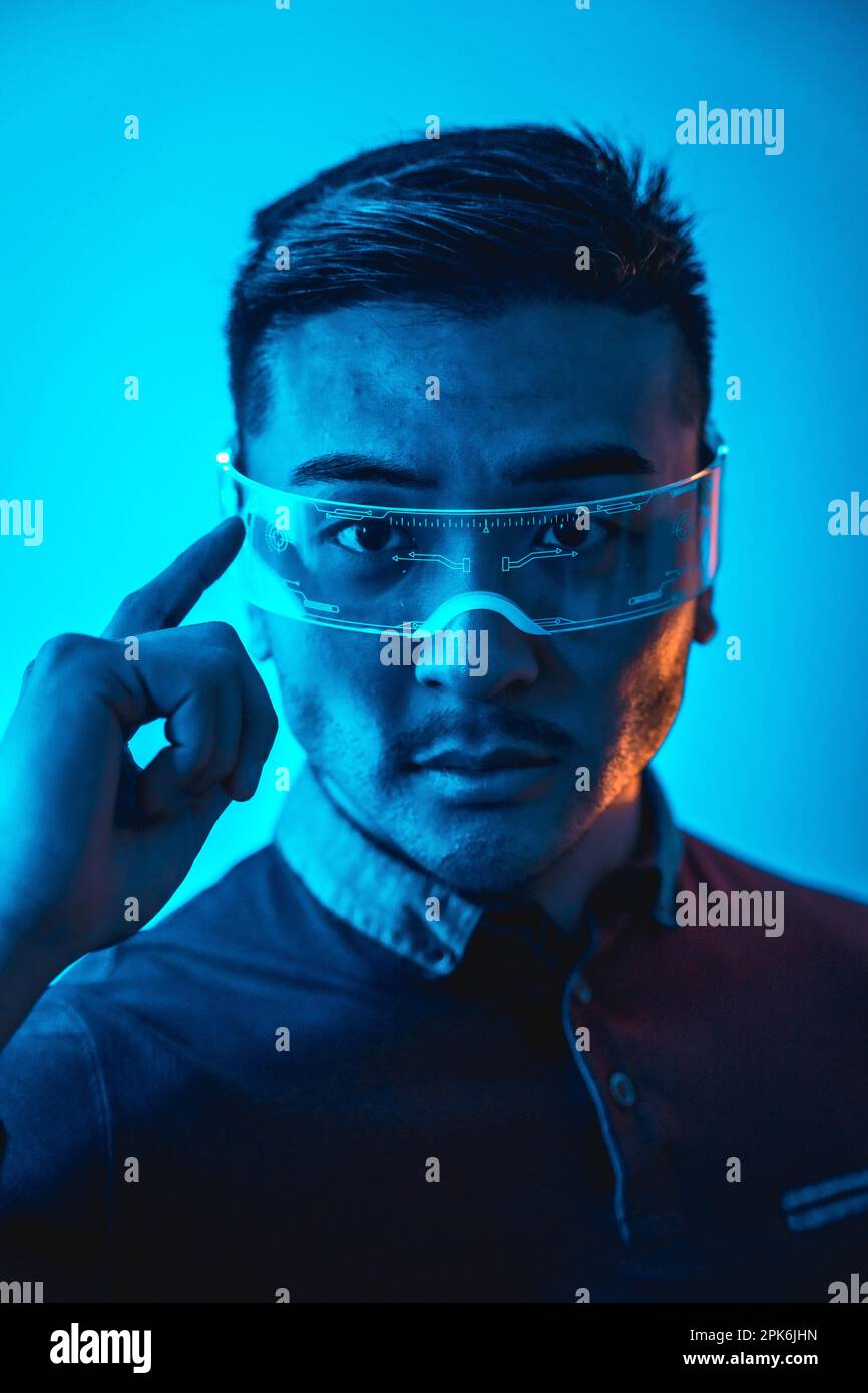Portrait of chinese man with neon glasses with blue light, futuristic ...
