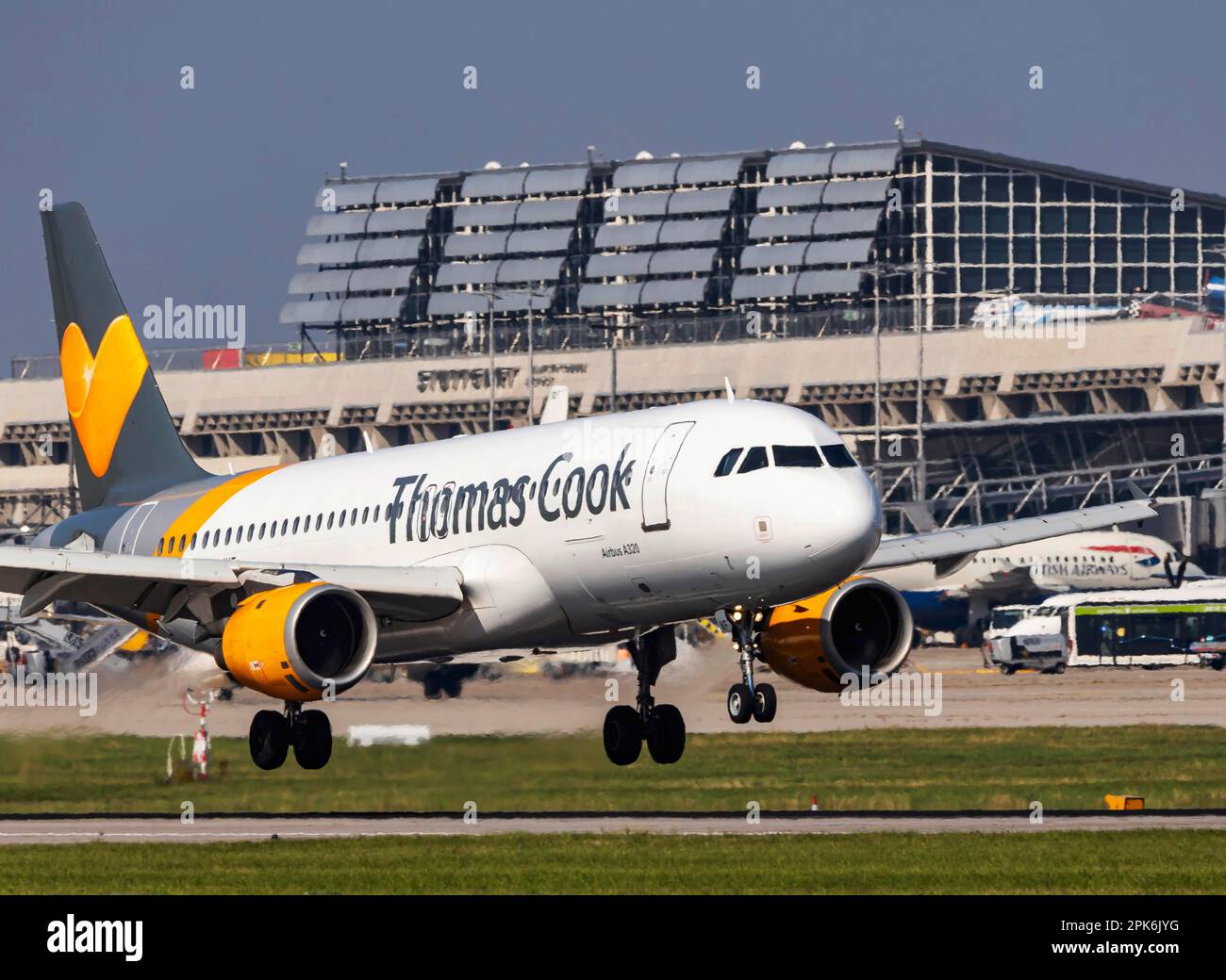 Thomas Cook aircraft on landing, terminal, Stuttgart Airport, Baden ...