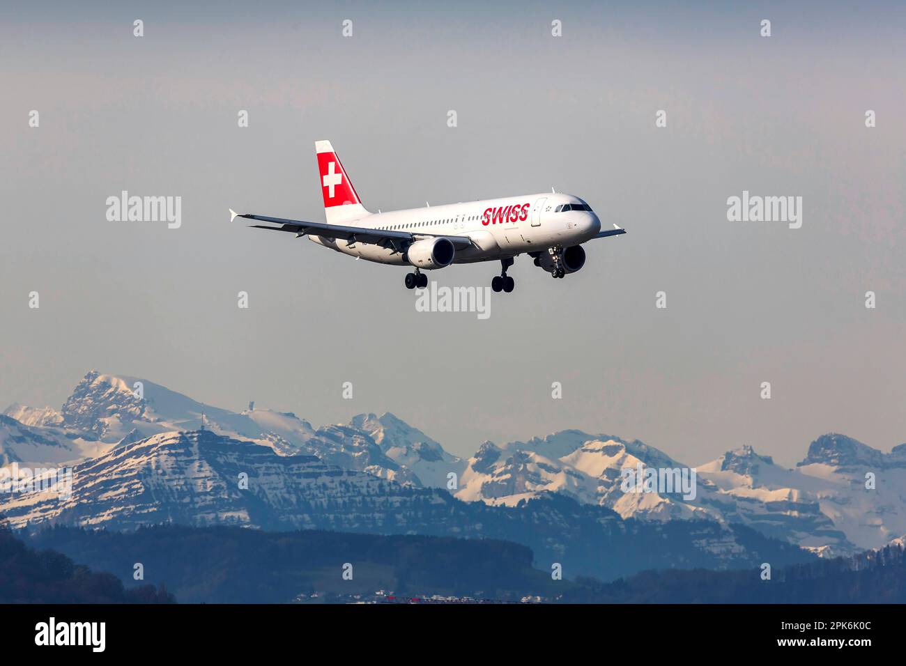 Aircraft approaching ZRH airport, airline Swiss, Airbus A320-200, snow ...