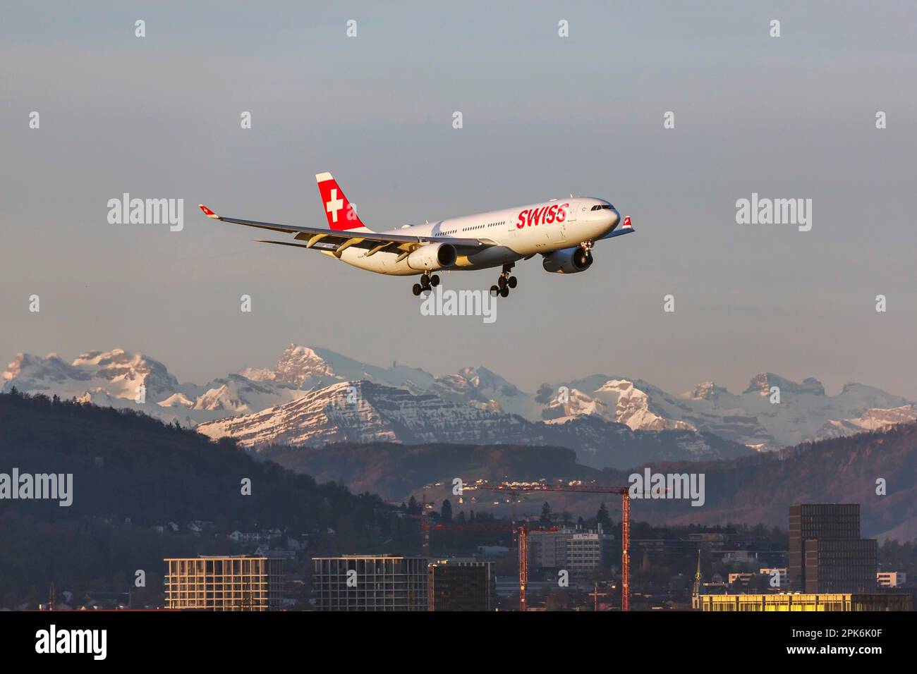 Aircraft approaching ZRH airport, airline Swiss, Airbus A330-300, snow ...