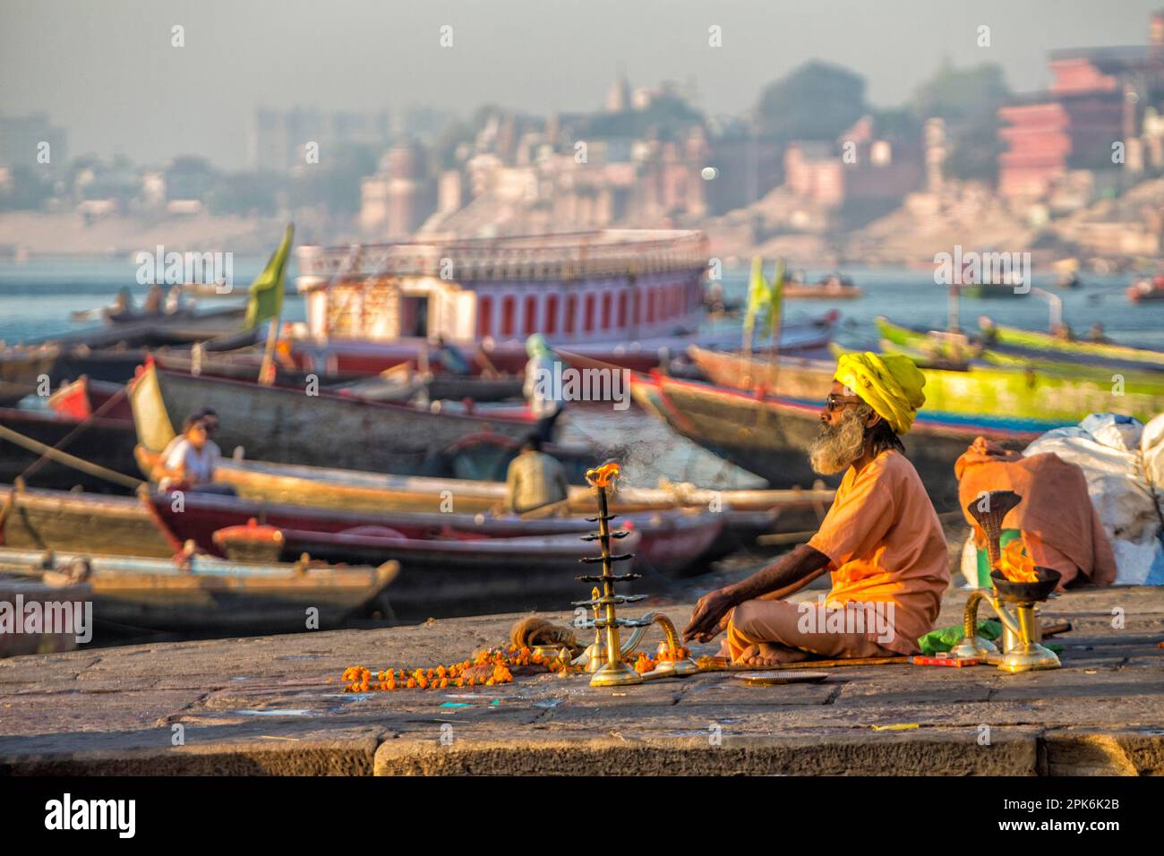 Spiritual morning prayer at the holy river Ganges in Varanasi, Hinduism ...