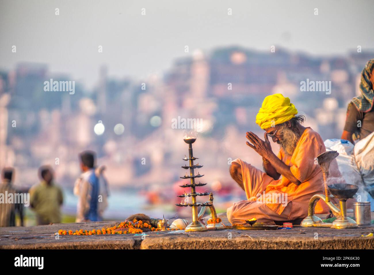Spiritual morning prayer at the holy river Ganges in Varanasi, Hinduism ...
