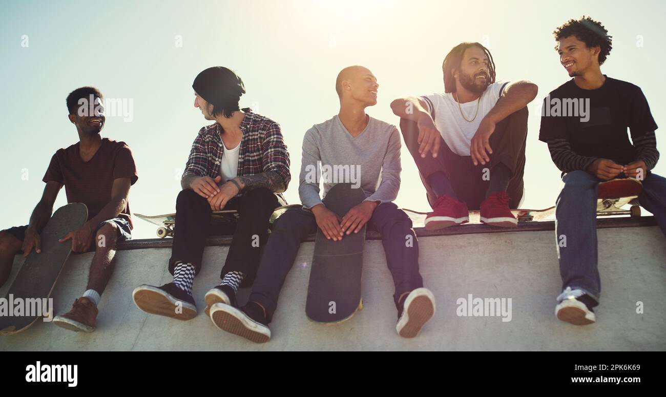 Fun day in the sun with the boys. Full length shot of a group of ...