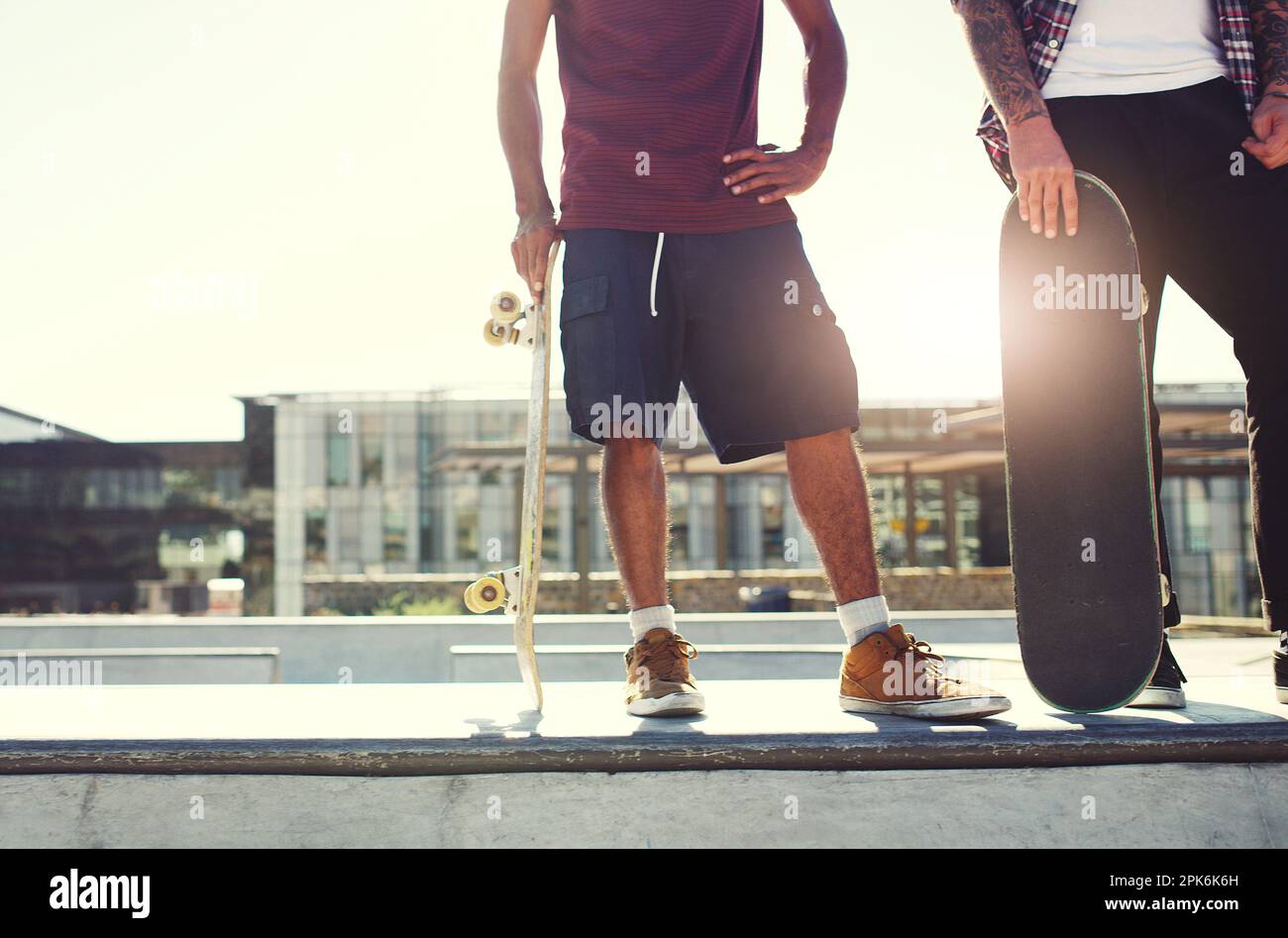 Two young men on skateboards hi-res stock photography and images - Alamy