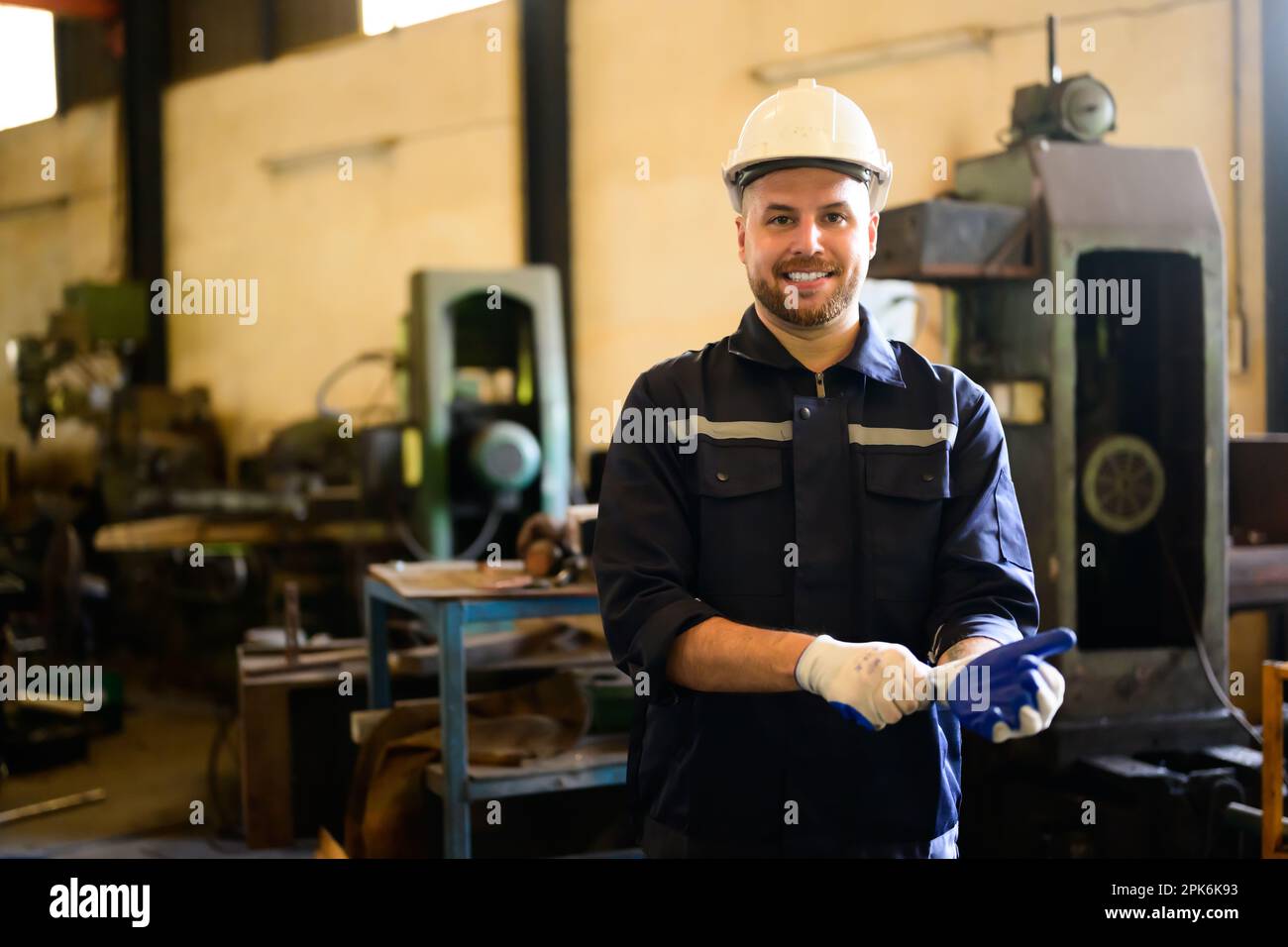 Maintenance engineer worker working at manufacturing plant factory ...