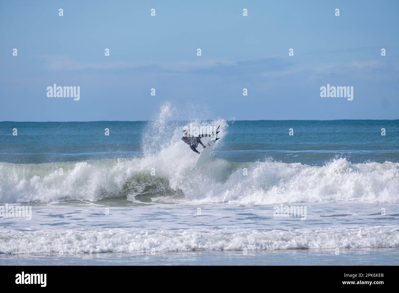 Surfers on the beach at Jeffreys Bay near Port Elizabeth, Garden Route ...