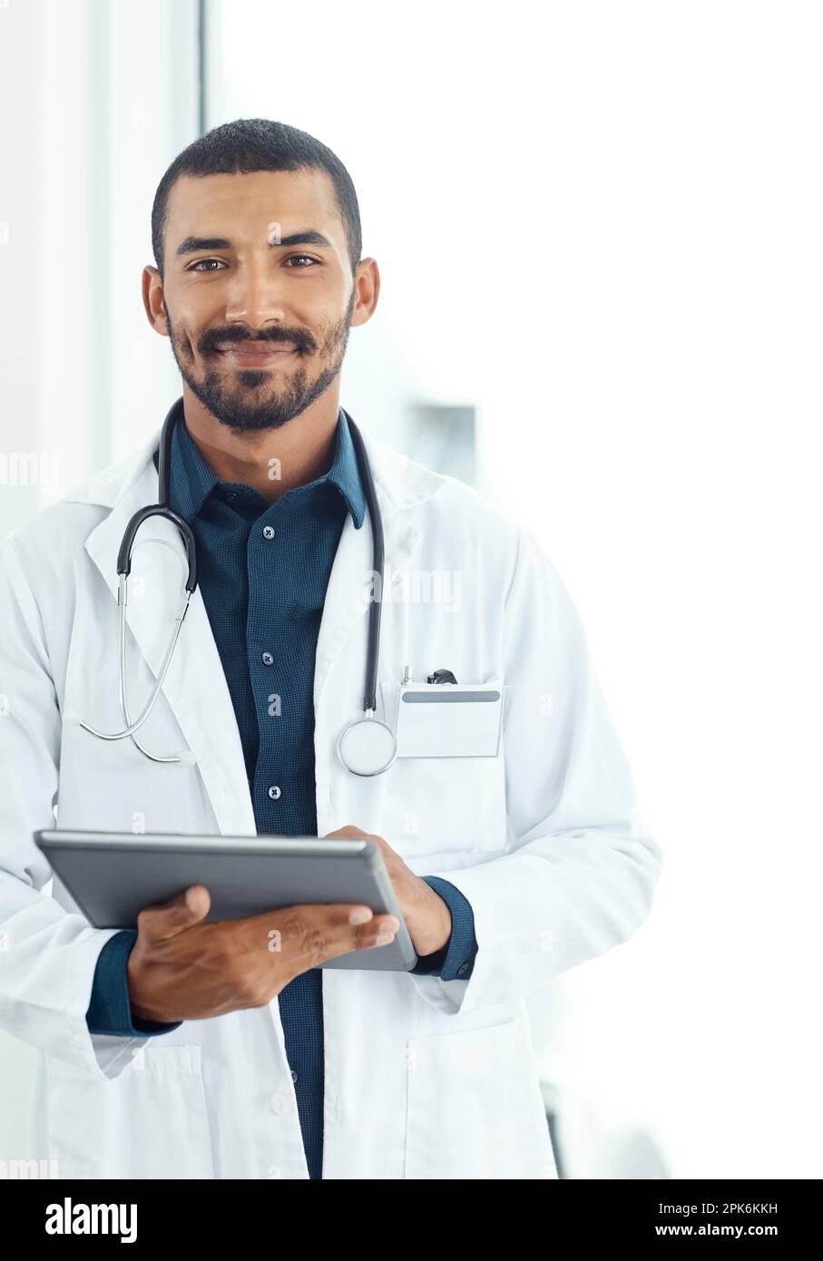 Getting to the diagnosis faster with smart tech. Portrait of a young ...