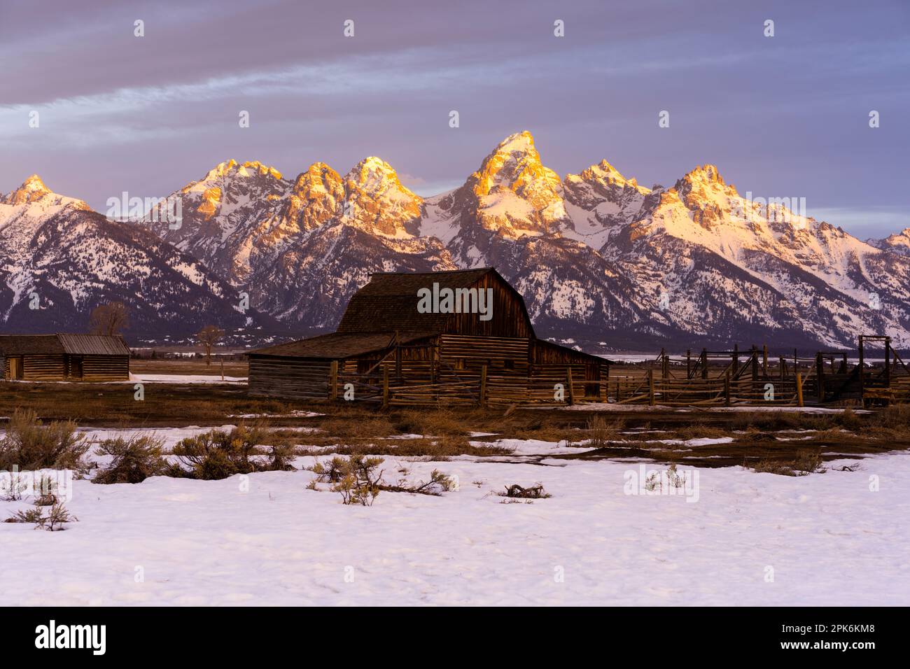 Farm in front of majestic mountains covered in snow, Wedge Mountain ...