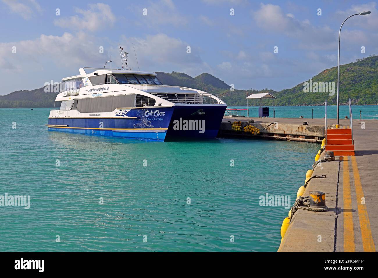 Catamaran ferry of the operator Cat Cocos in the harbour of Praslin ...