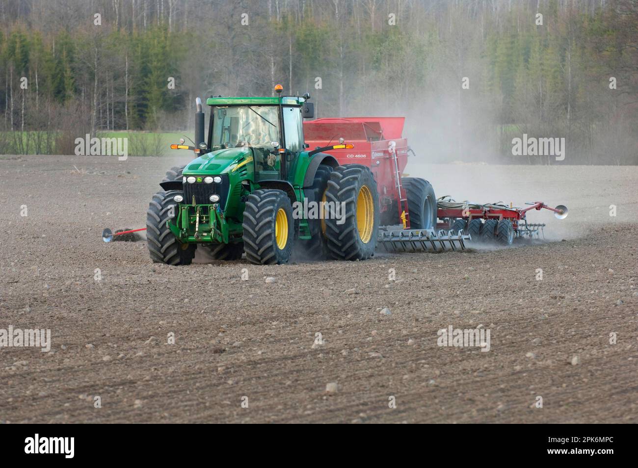 John Deere 7720 tractor with Overum seed drill, arable farming, Sweden ...