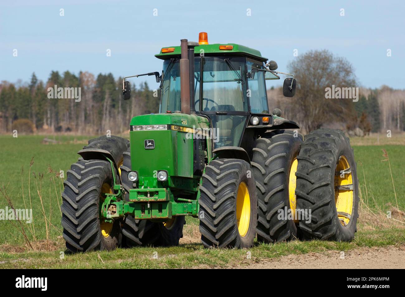 John Deere 4455 tractor with double wheels, Sweden Stock Photo - Alamy