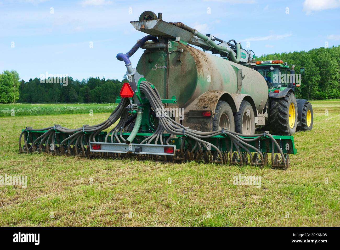 John deere tractor with slurry tanker hi-res stock photography and ...