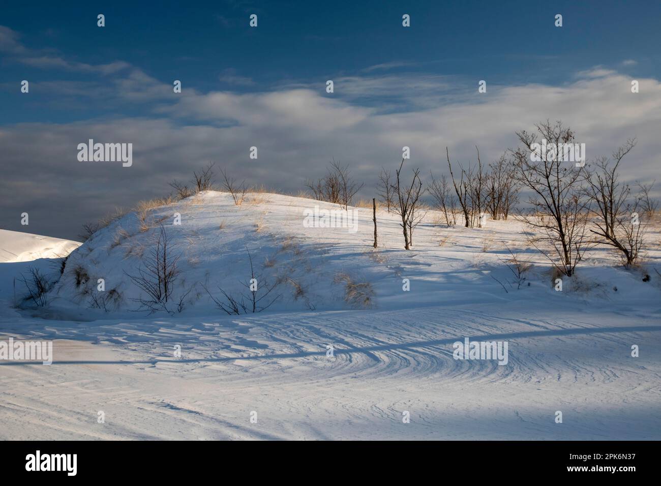 Au Train, Michigan, A sand dune on the shore of Lake Superior in winter ...