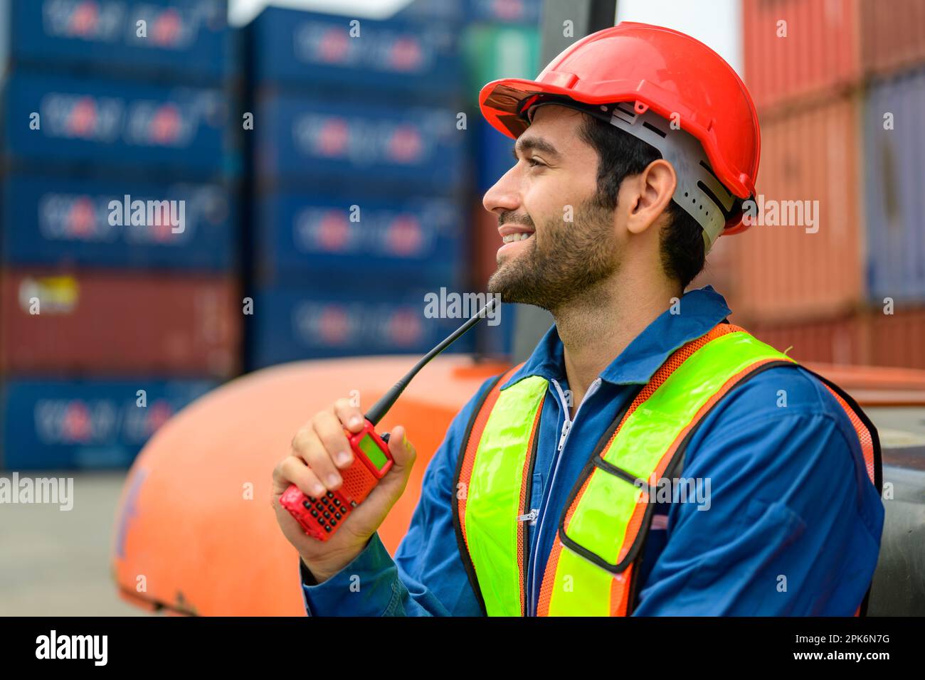 Warehouse engineer worker checking and working at industrial container ...