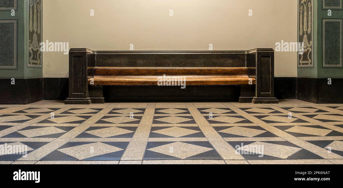 Wooden bench in retro style in the vestibule of Spandau Town Hall ...