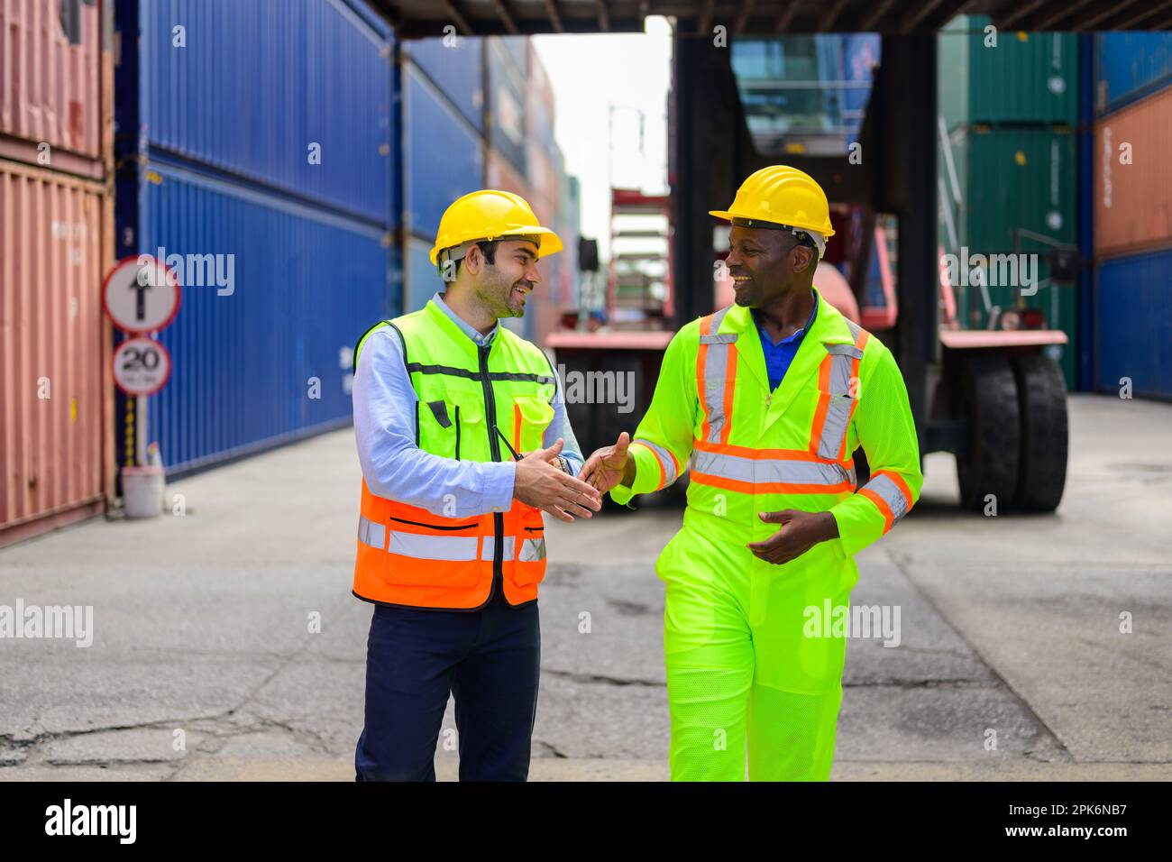 Warehouse engineer worker working at industrial container yard Stock ...