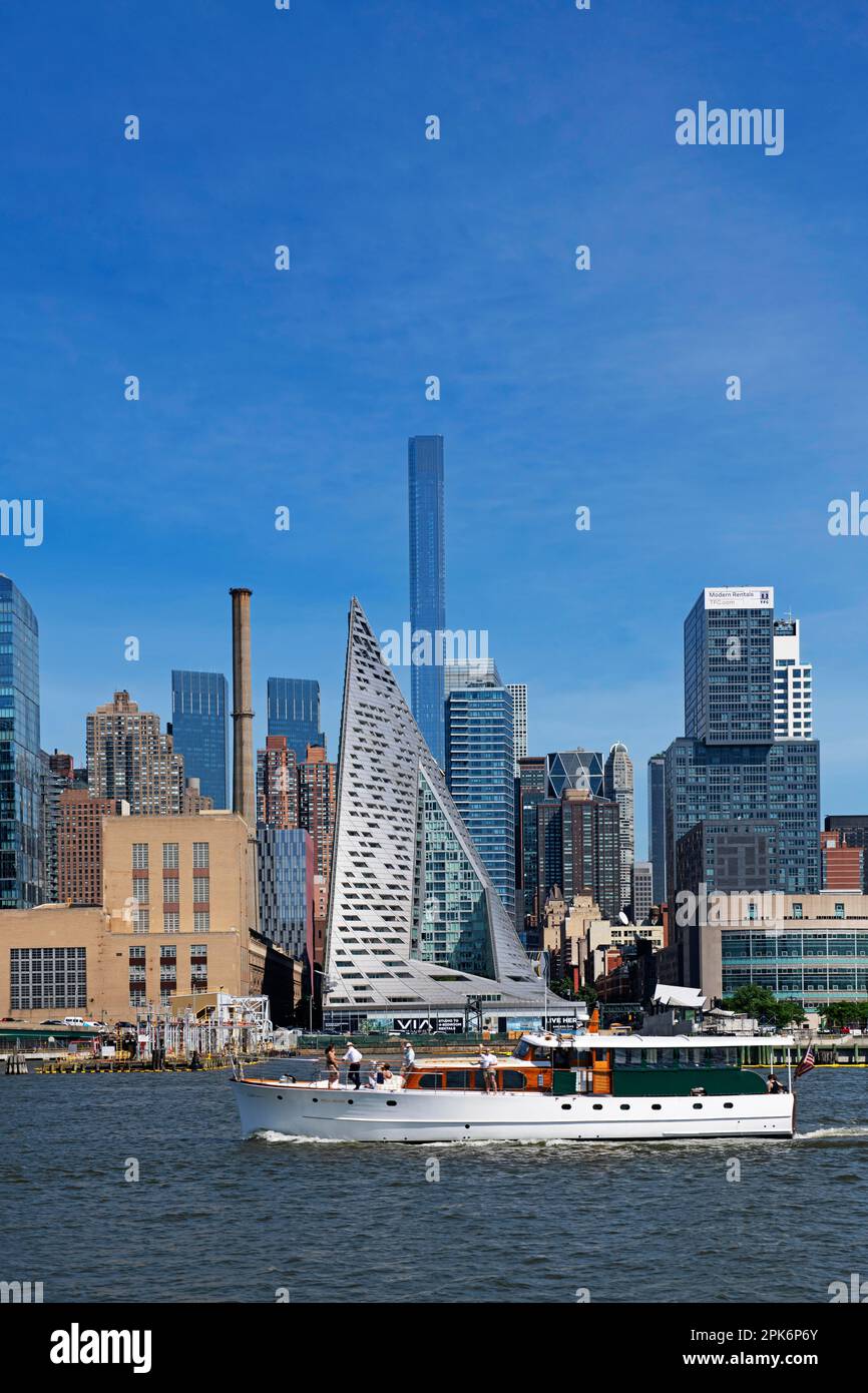 Motorboat in front of VIA 57 West, pyramid-shaped residential high-rise ...