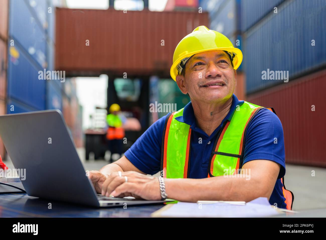 Warehouse engineer worker checking and working at industrial container ...