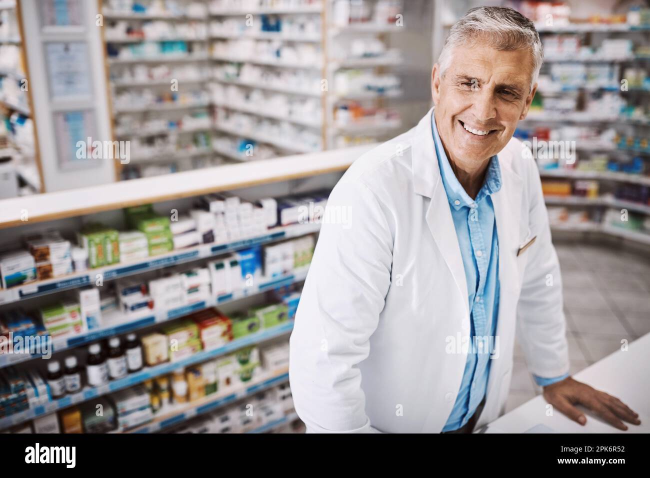 Ill cheer you up in no time. a pharmacist working in a drugstore Stock ...