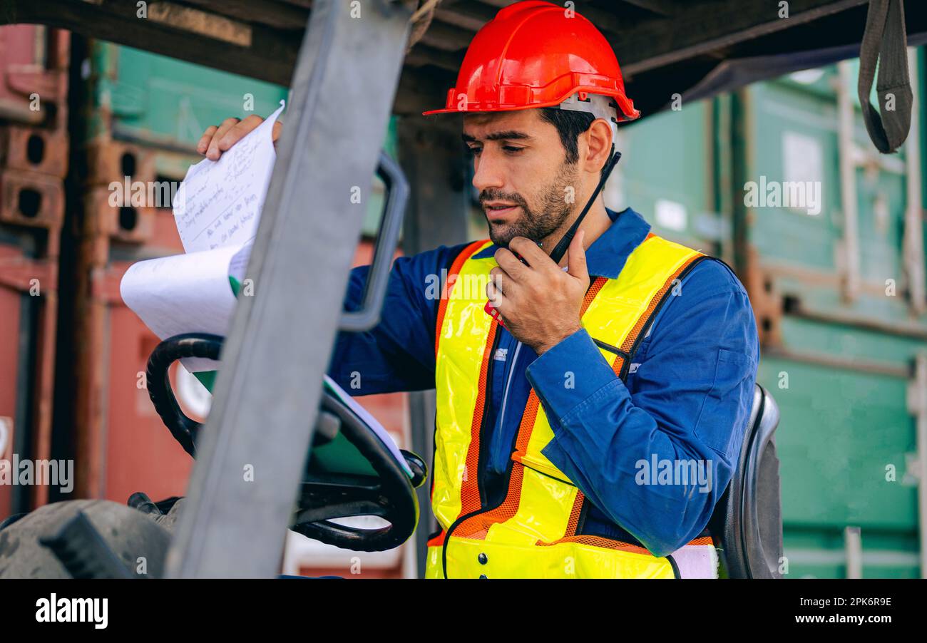 Warehouse engineer worker working at industrial container yard Stock ...