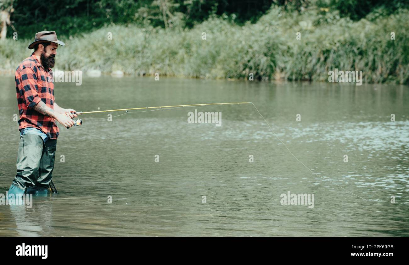 Bearded man catching fish. Fishing background. Senior man fishing ...