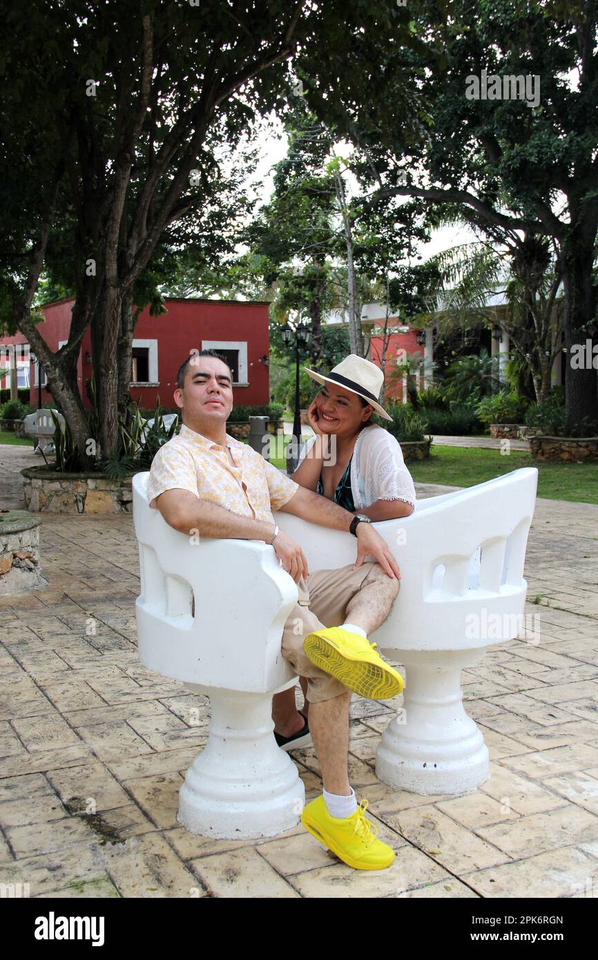 Mexican woman sitting on bench hi-res stock photography and images - Alamy