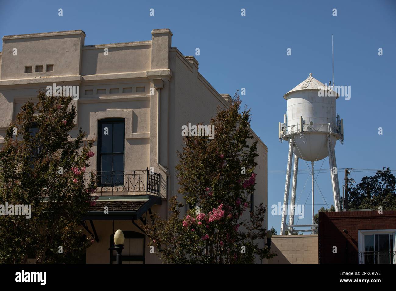 Afternoon sun shines on the historic downtown water tower of Elk Grove ...