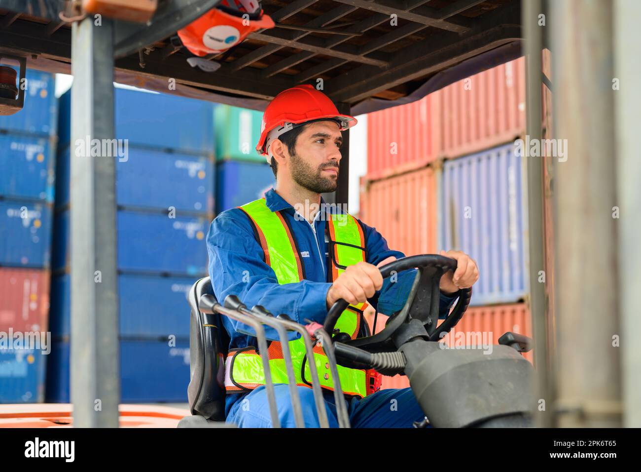 Warehouse engineer worker checking and working at industrial container ...