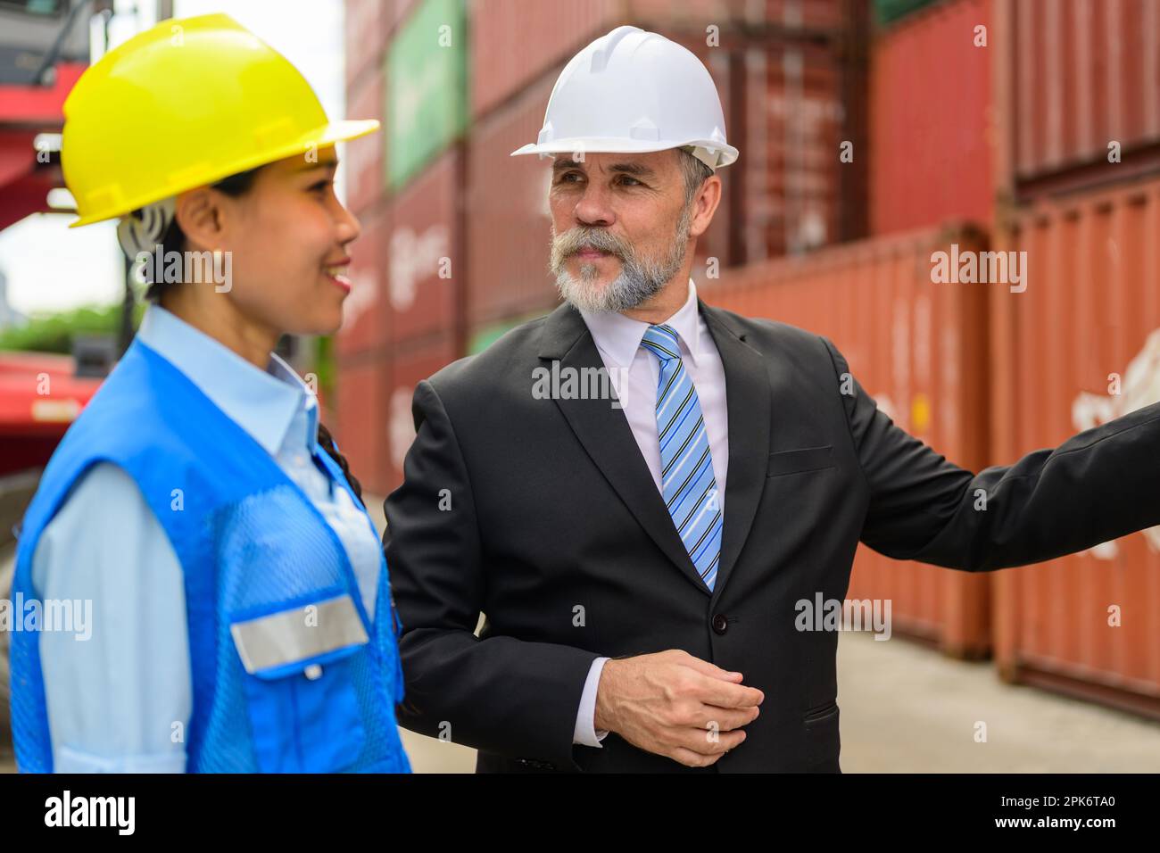 Warehouse engineer worker working at industrial container yard Stock ...