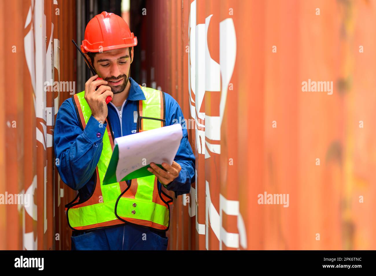 Warehouse engineer worker working at industrial container yard Stock ...