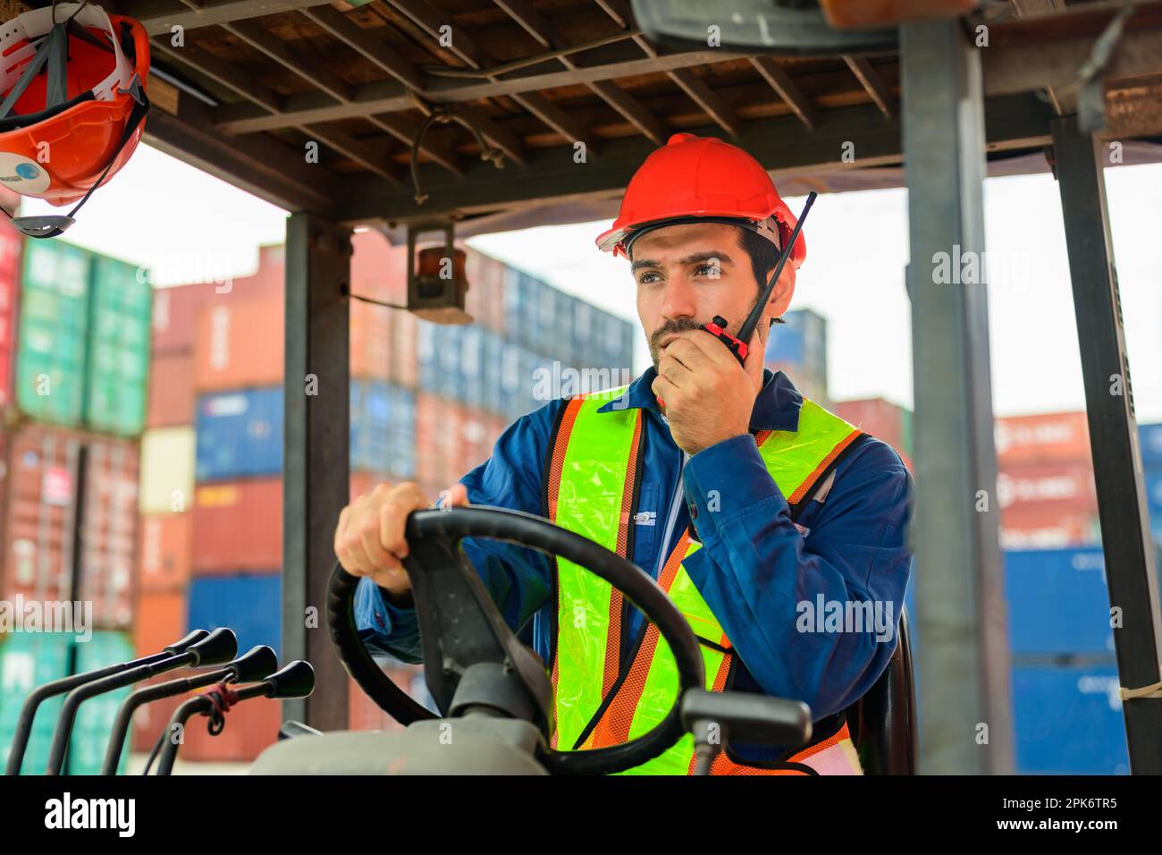 Warehouse engineer worker checking and working at industrial container ...