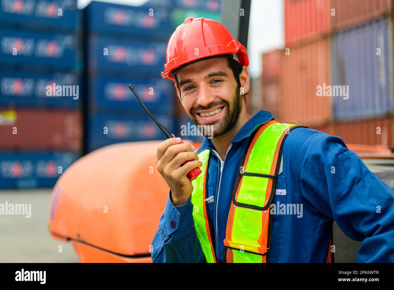 Warehouse engineer worker checking and working at industrial container ...