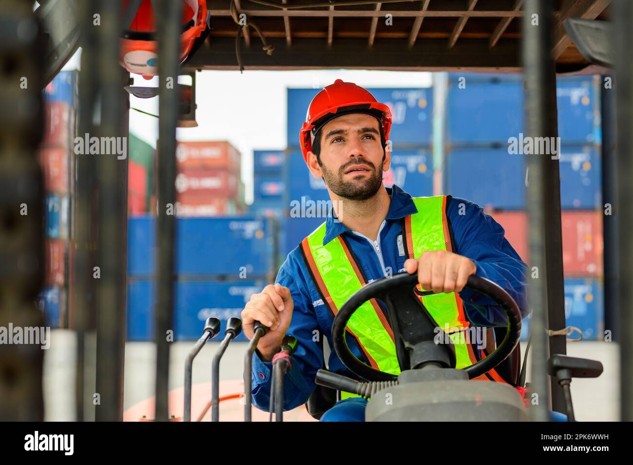 Warehouse engineer worker checking and working at industrial container ...
