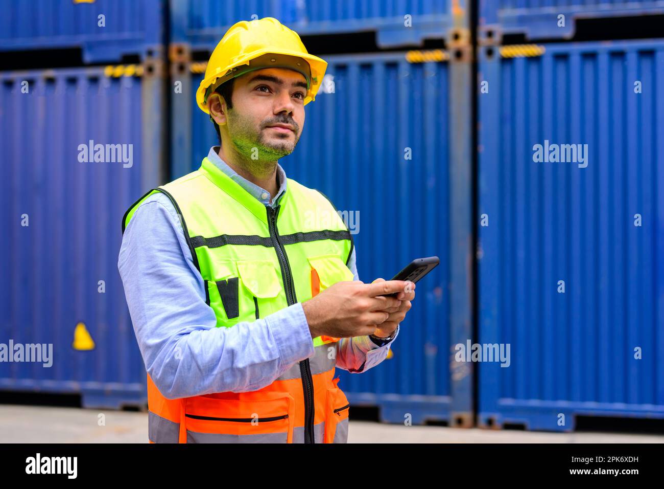 Warehouse engineer worker working at industrial container yard Stock ...