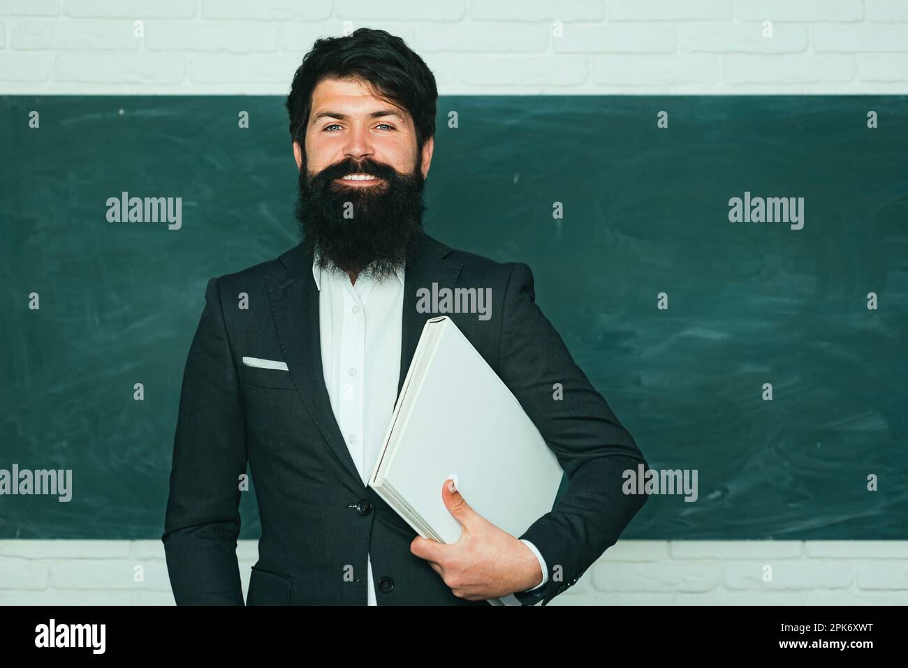 Tutoring. Back to school and happy time. Bearded professor at school ...