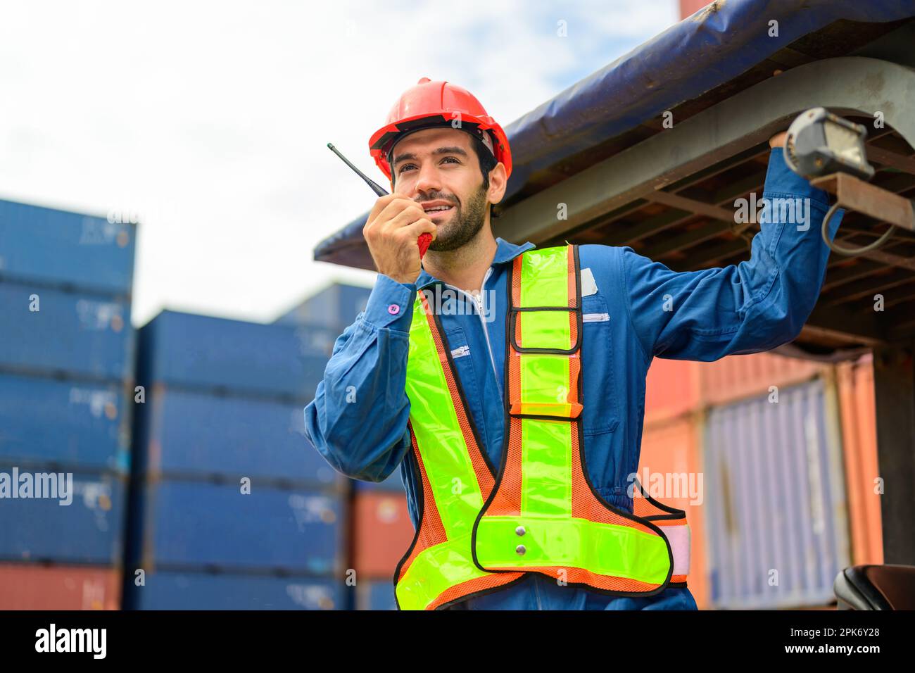 Warehouse engineer worker checking and working at industrial container ...